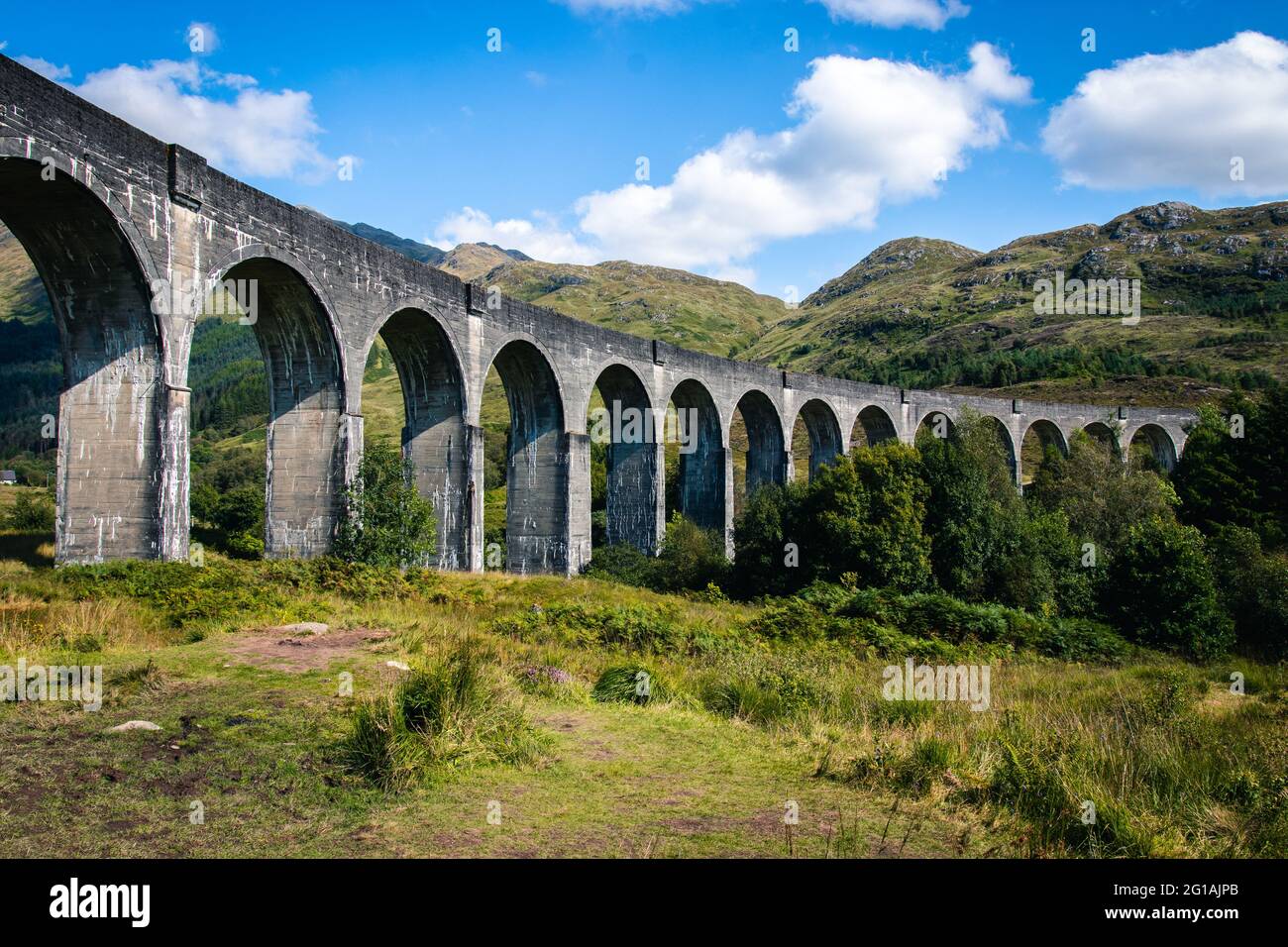An aerial view of Glenfinnan Viaduct, a concrete archway in the ...