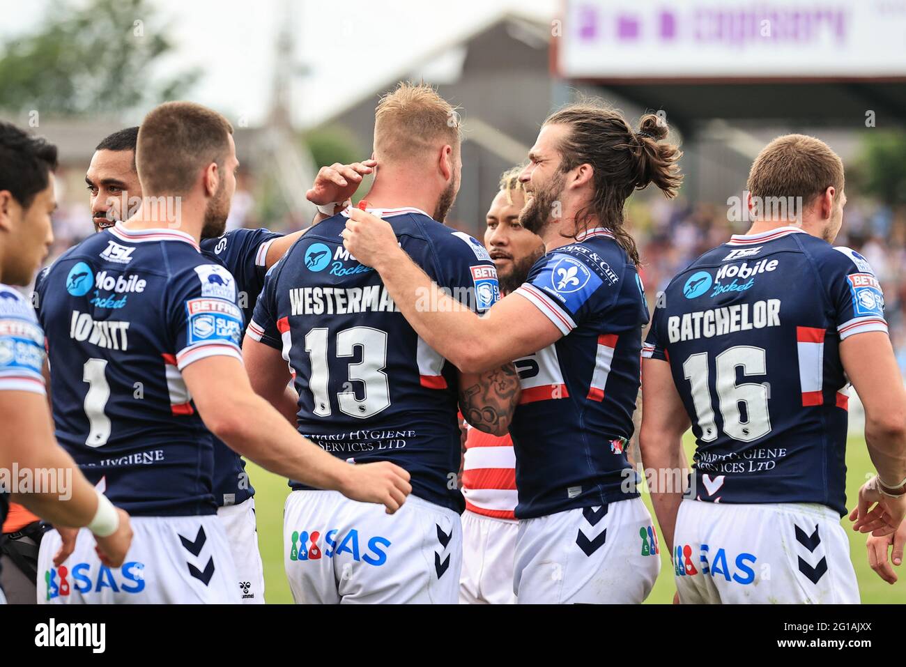 Joe Westerman (13) of Wakefield Trinity celebrates his 100th career try ...