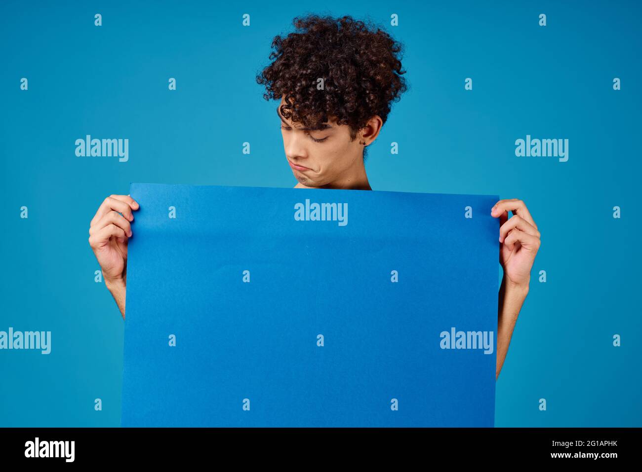 guy holding blue banner advertisement copy space isolated background ...