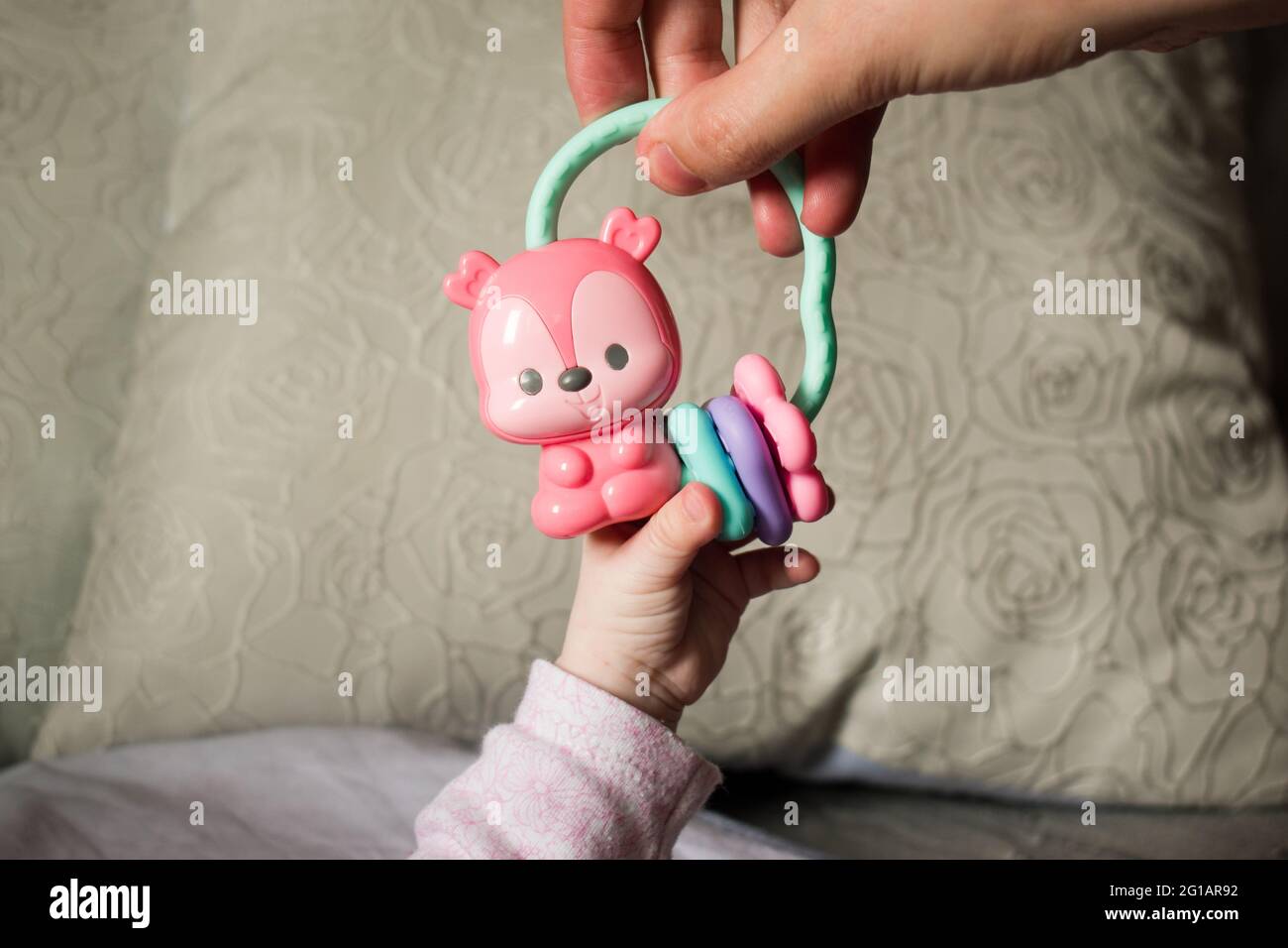 Child grabbing toy hi-res stock photography and images - Alamy
