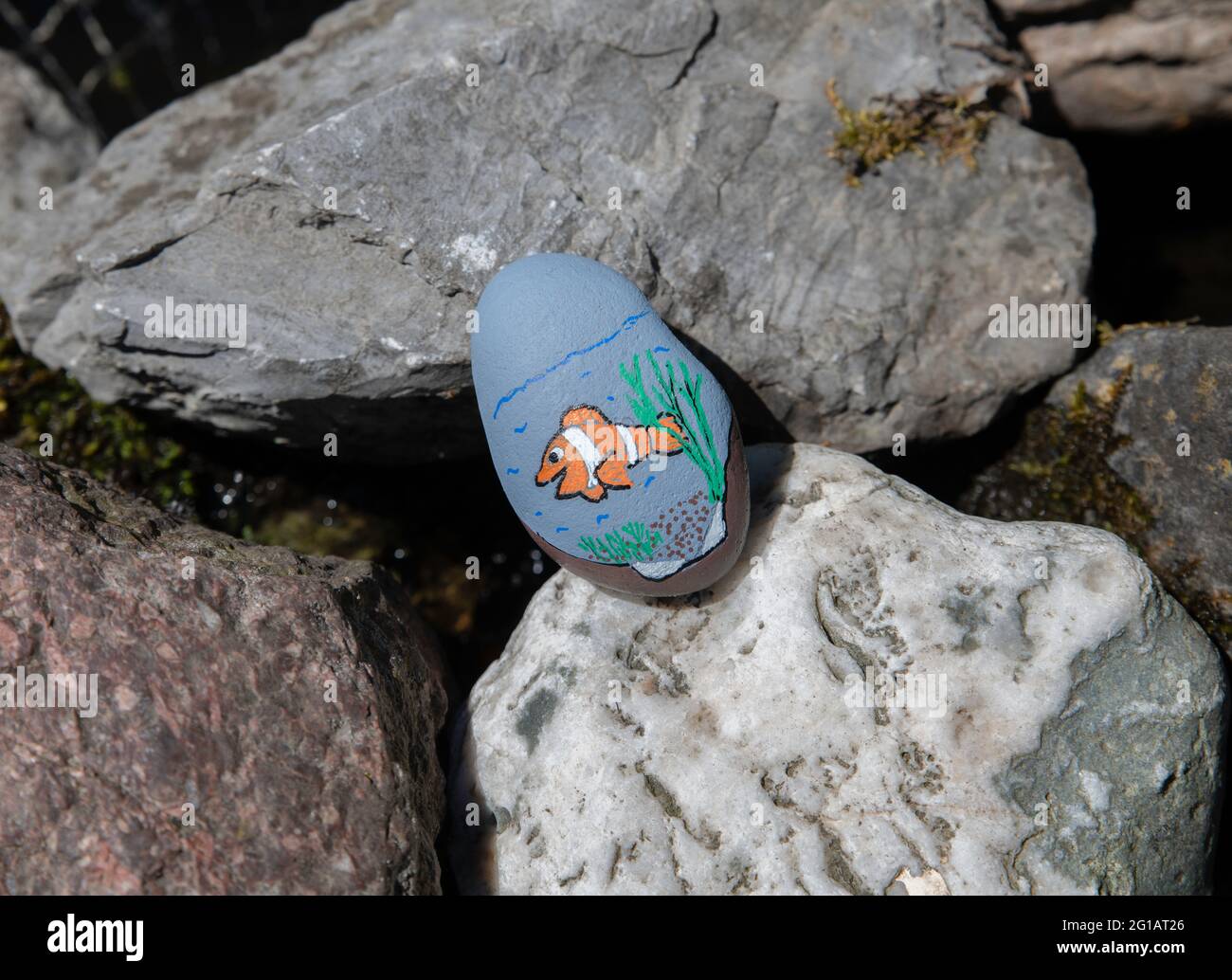 painted stone called happy stones Stock Photo - Alamy