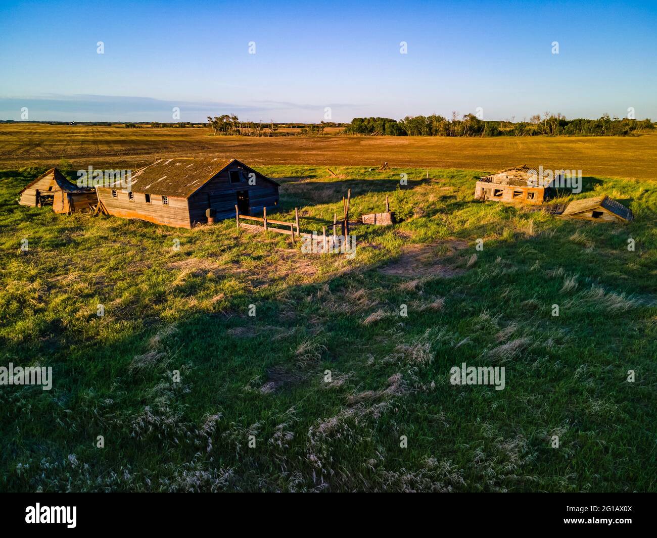An aerial view of an old farm yard that has been abandoned, forgotten ...