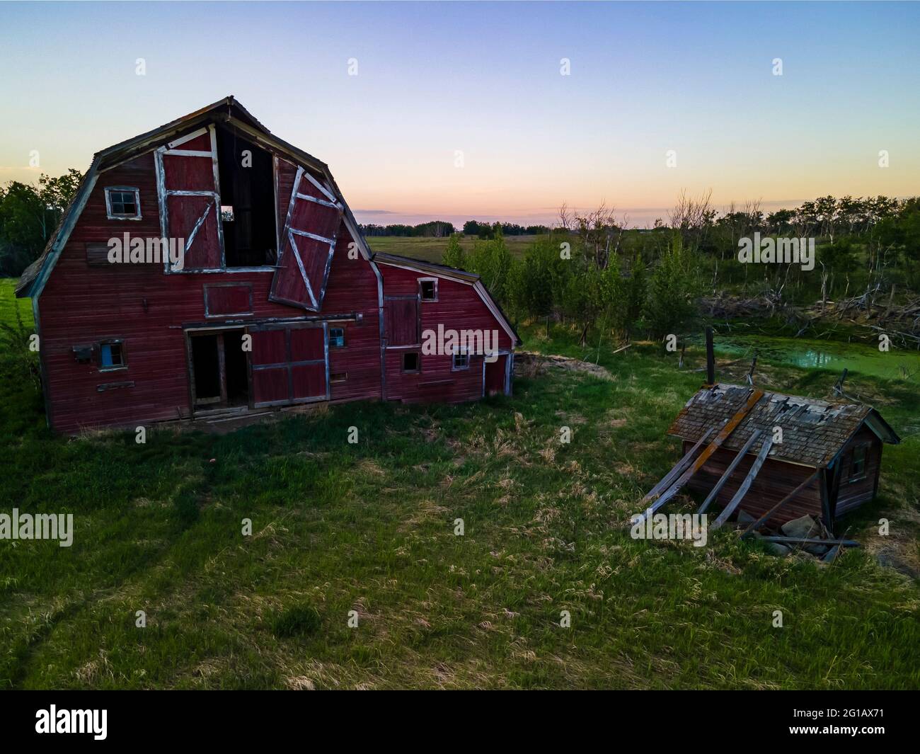 An aerial view of an old abandoned barn built by the first farming ...