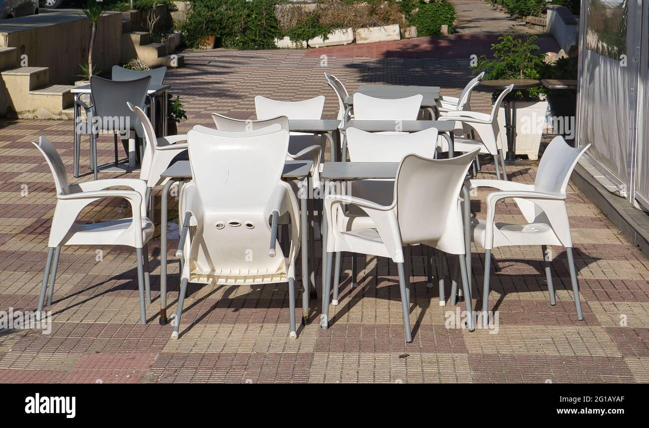 tables and chairs in a closed bar, view Stock Photo - Alamy