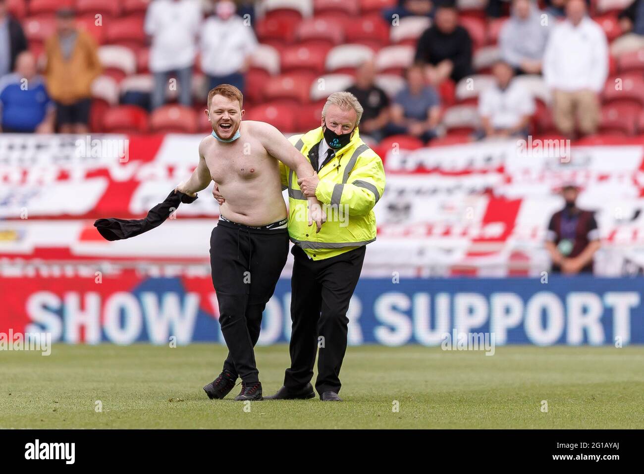 A streaker is tackled by a steward hi-res stock photography and images ...