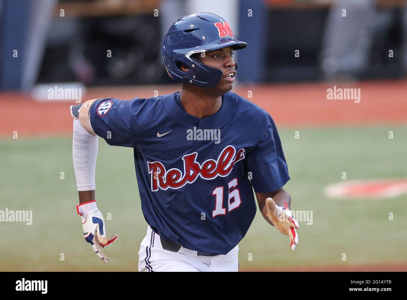 June 04, 2021: Ole Miss infielder TJ McCants (16) runs out a hit during ...