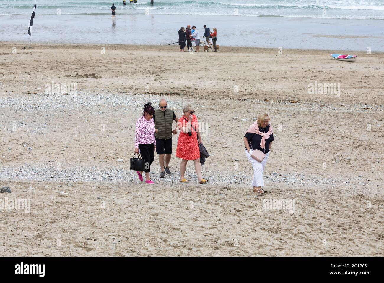 People on the beach in Portreath, Cornwall,UK Stock Photo - Alamy