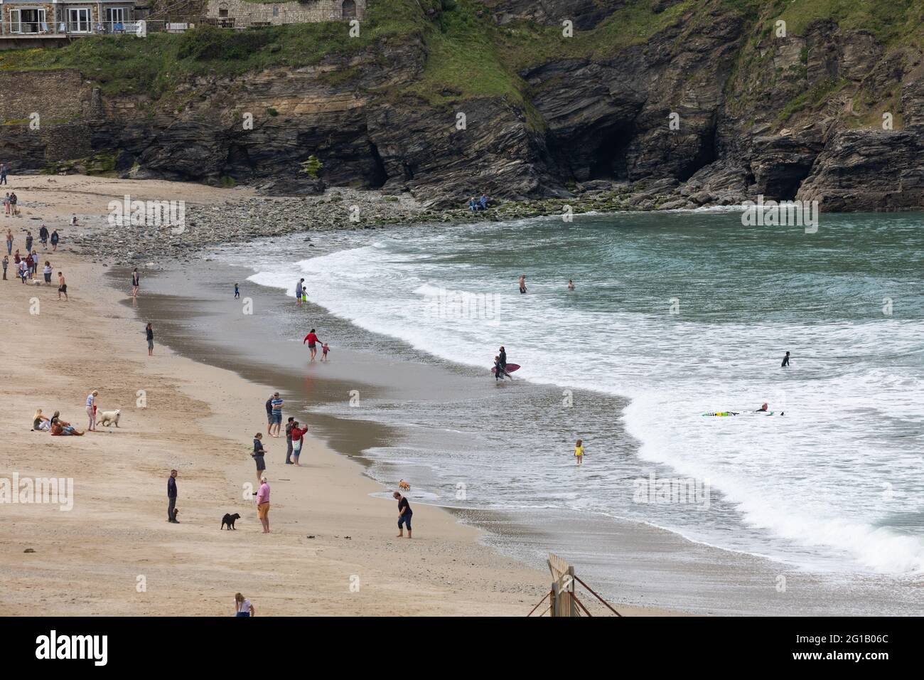 People on the beach in Portreath, Cornwall,UK Stock Photo - Alamy