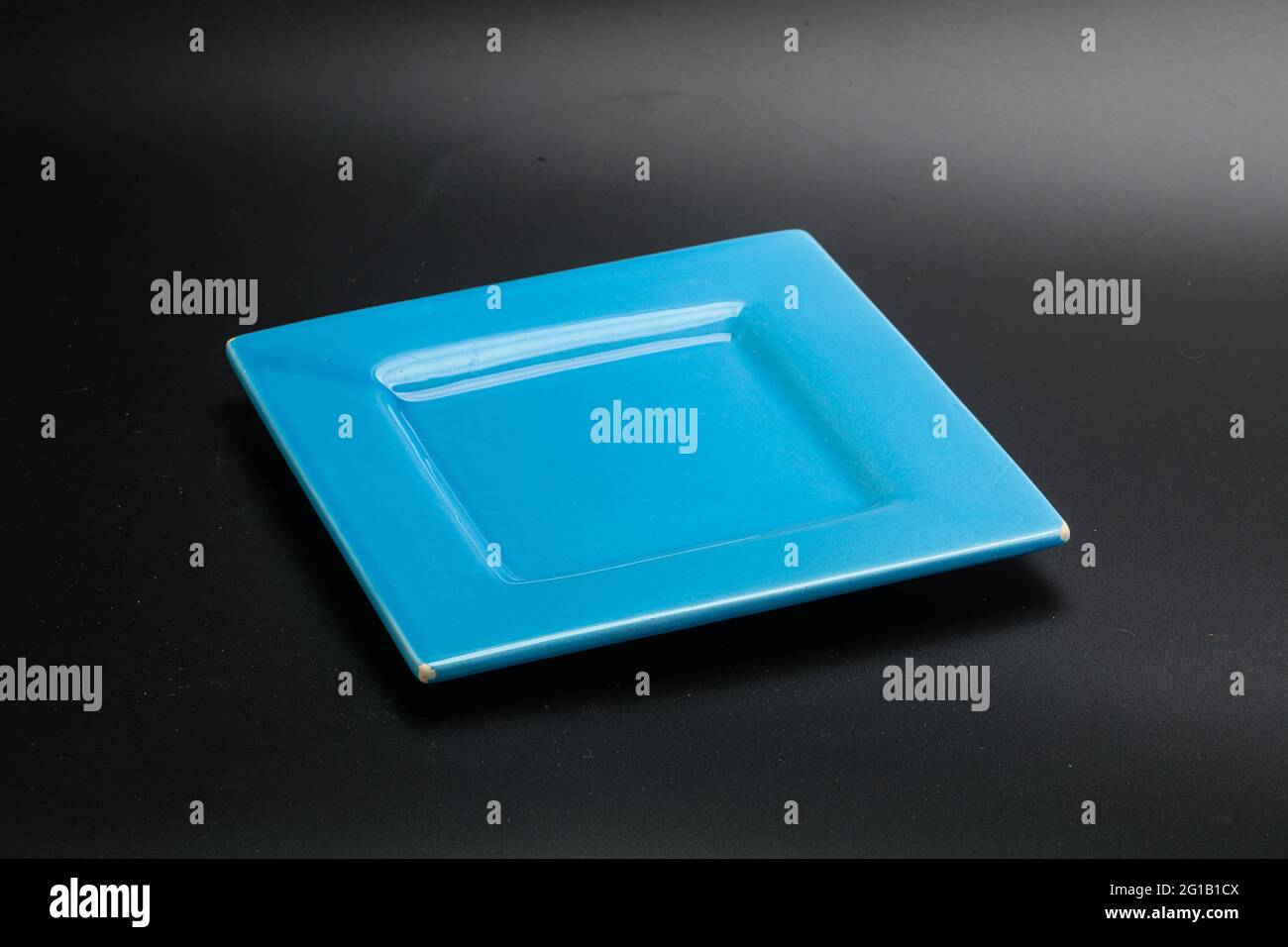 Empty color plate for kitchen isolated Stock Photo - Alamy