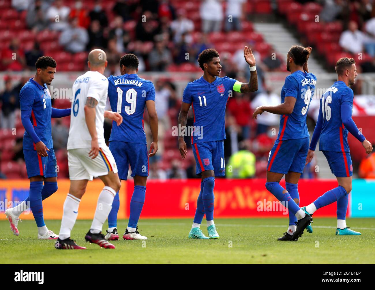 England's Marcus Rashford (centre) celebrates scoring their side's ...