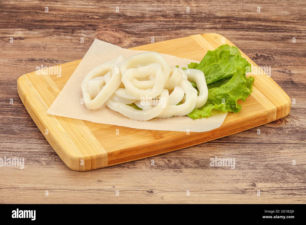 Raw squid rings ready for cooking Stock Photo - Alamy