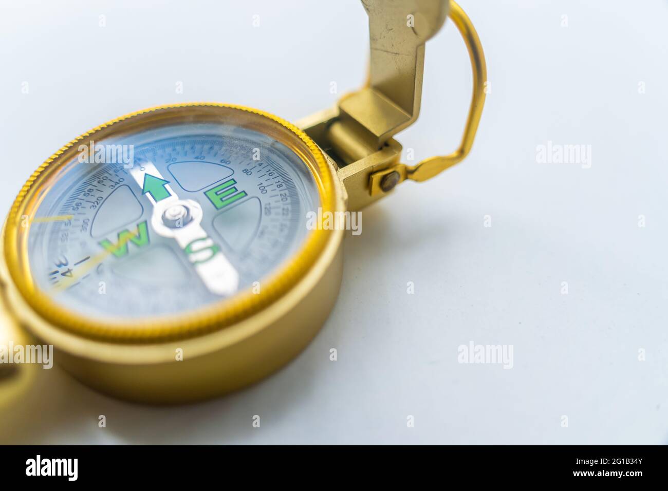Banner of golden compass isolated, shallow DOF, focus on dial. Compass ...