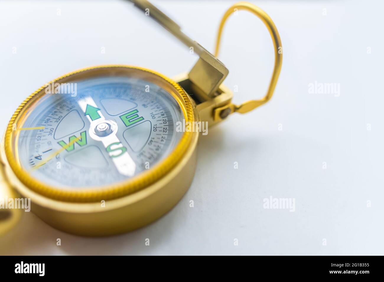 Banner of golden compass isolated, shallow DOF, focus on dial. Compass ...