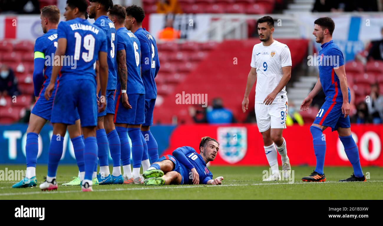 England's Jack Grealish (centre) creates a defensive wall during the ...