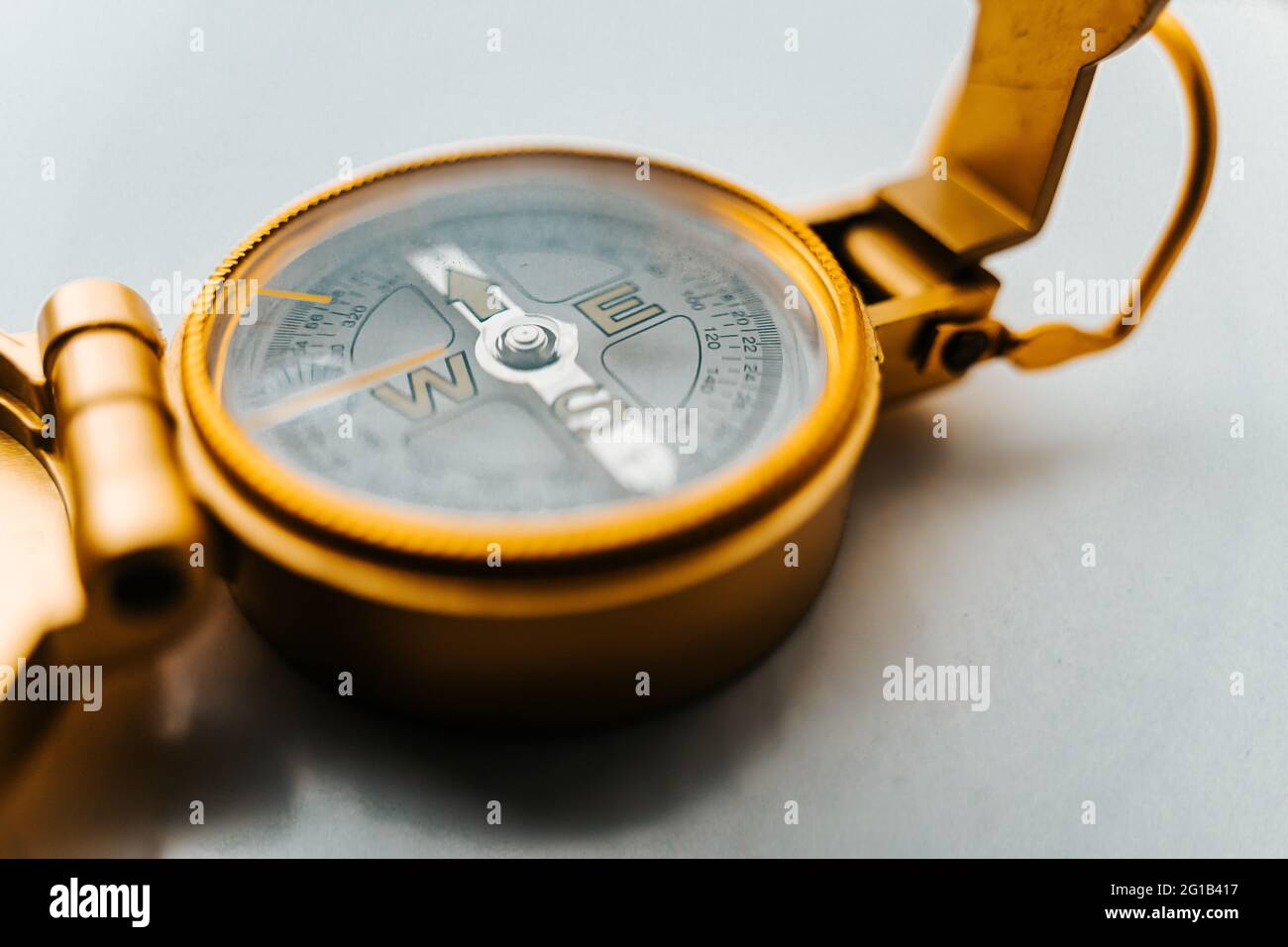 Banner of golden compass isolated, shallow DOF, focus on dial. Compass ...