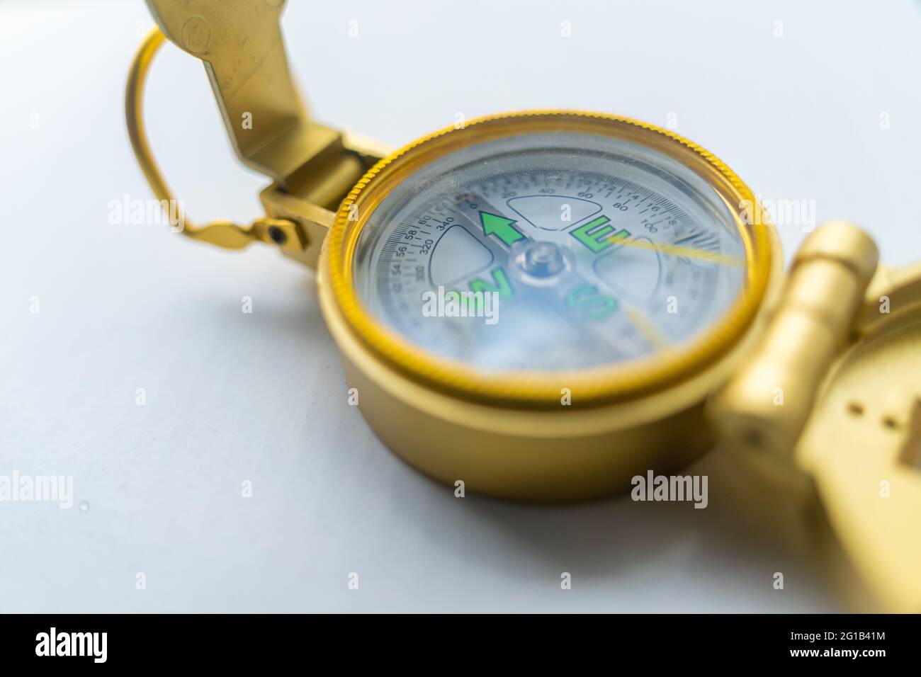 Banner of golden compass isolated, shallow DOF, focus on dial. Compass ...
