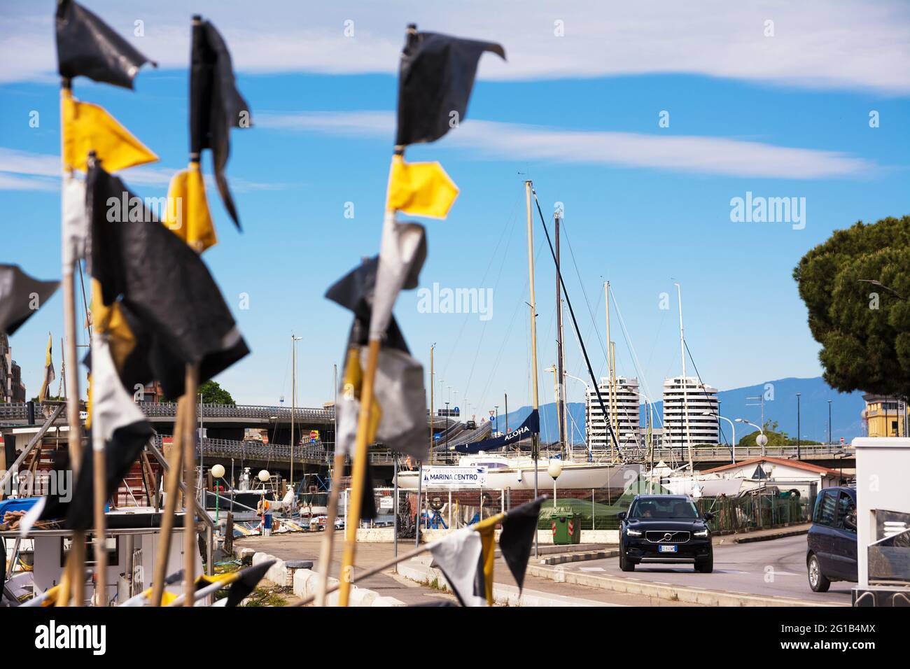 Pescara, Italy - 22 May 2021: Port area of Pescara with the flags of ...