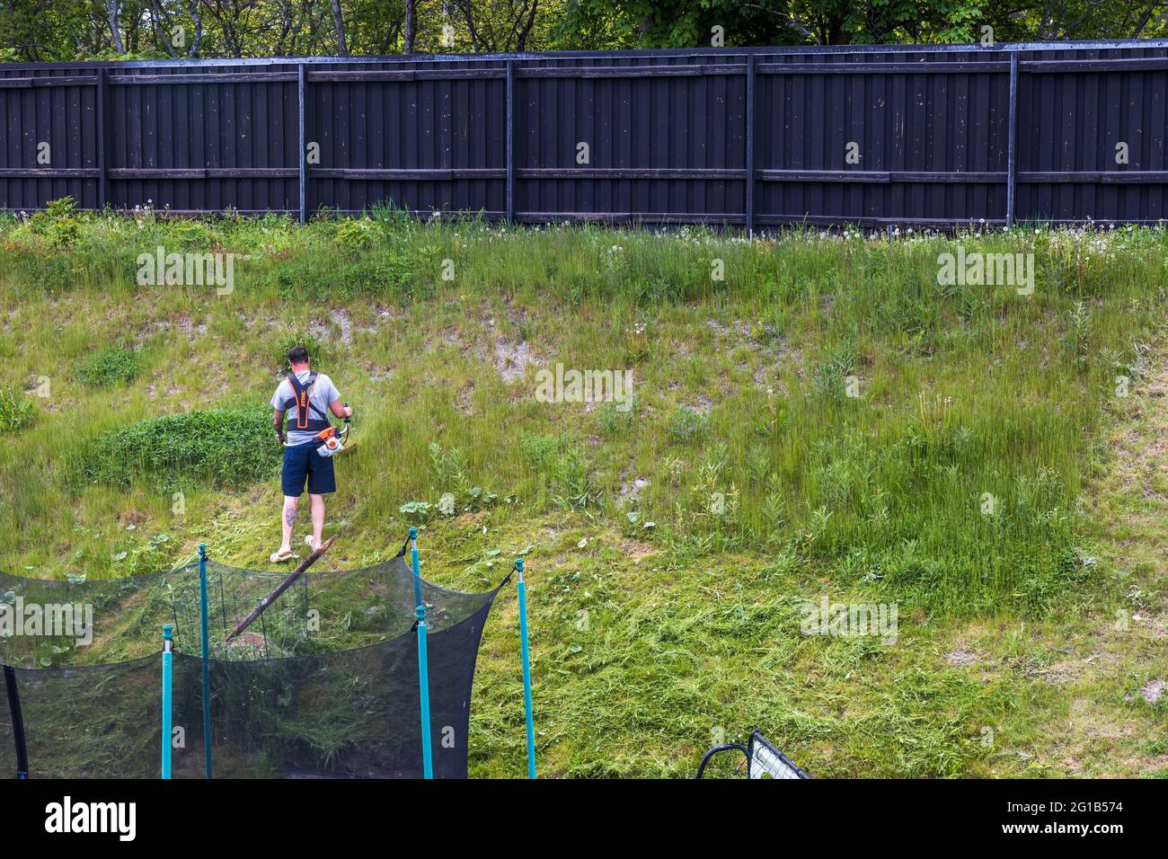 Man cutting grass hi-res stock photography and images - Alamy