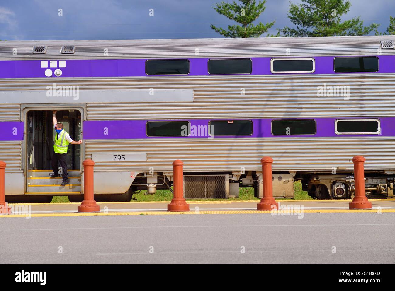 Hermitage, Tennessee, USA. A conductor signals all clear to the ...