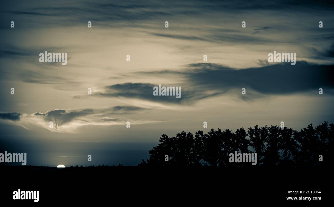 Impressive sunset in atmospheric dark melody mood melancholy - colorful ...