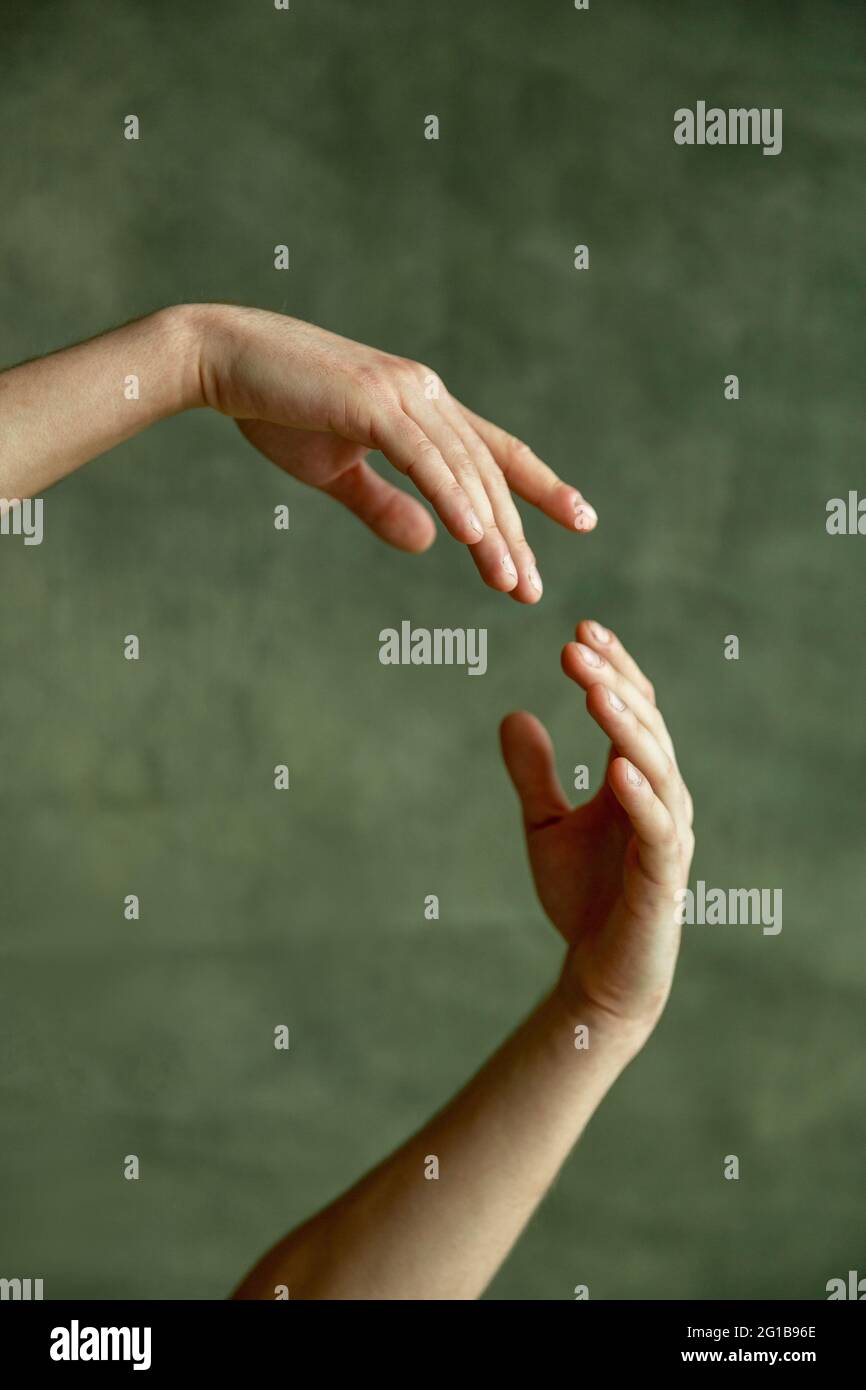 Male ballet dancer hands, grunge background Stock Photo - Alamy