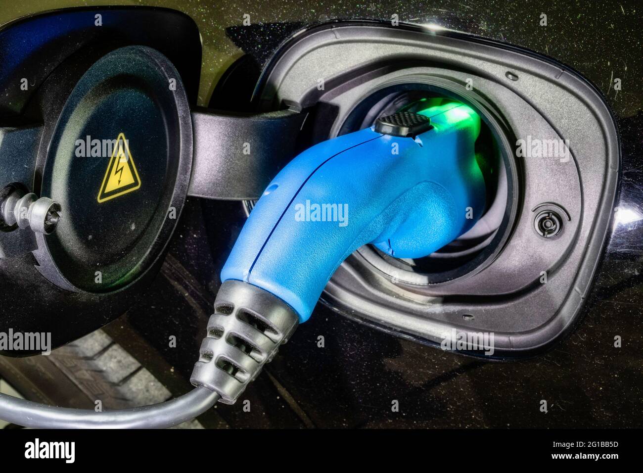 Electric vehicle ev battery charging station hi-res stock photography ...