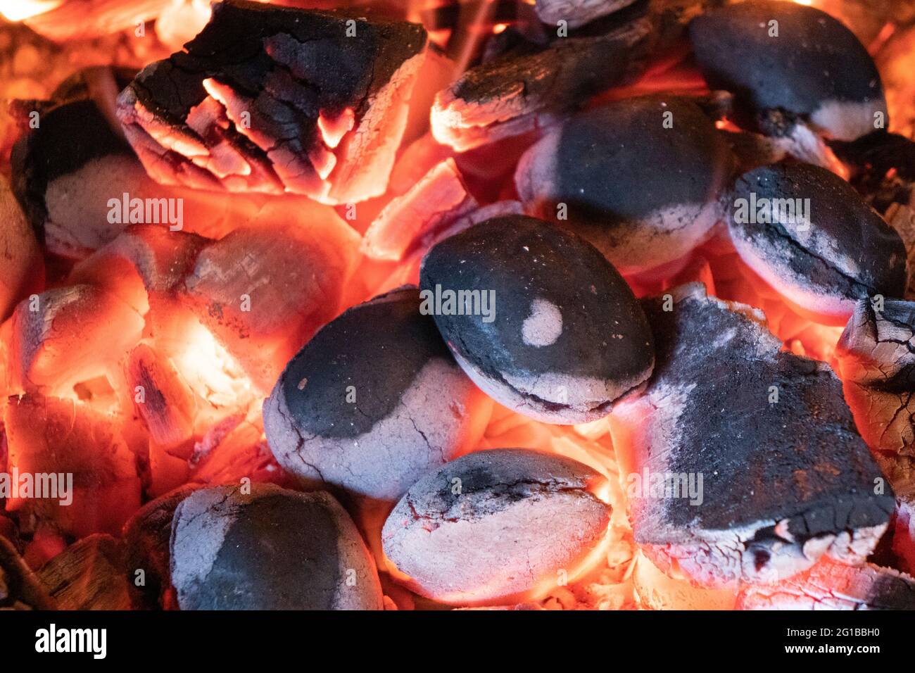 Hot fireplace full of wood. Real Flames from burning logs texture ...