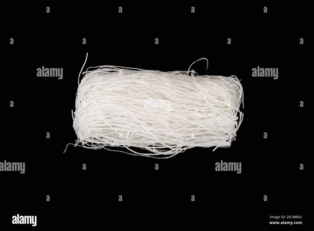 Green bean noodles isolated on black background. Raw funchose. Glass ...