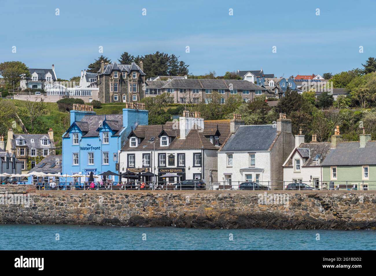 The image is of seafront houses that line the promenade at Portpatrick ...