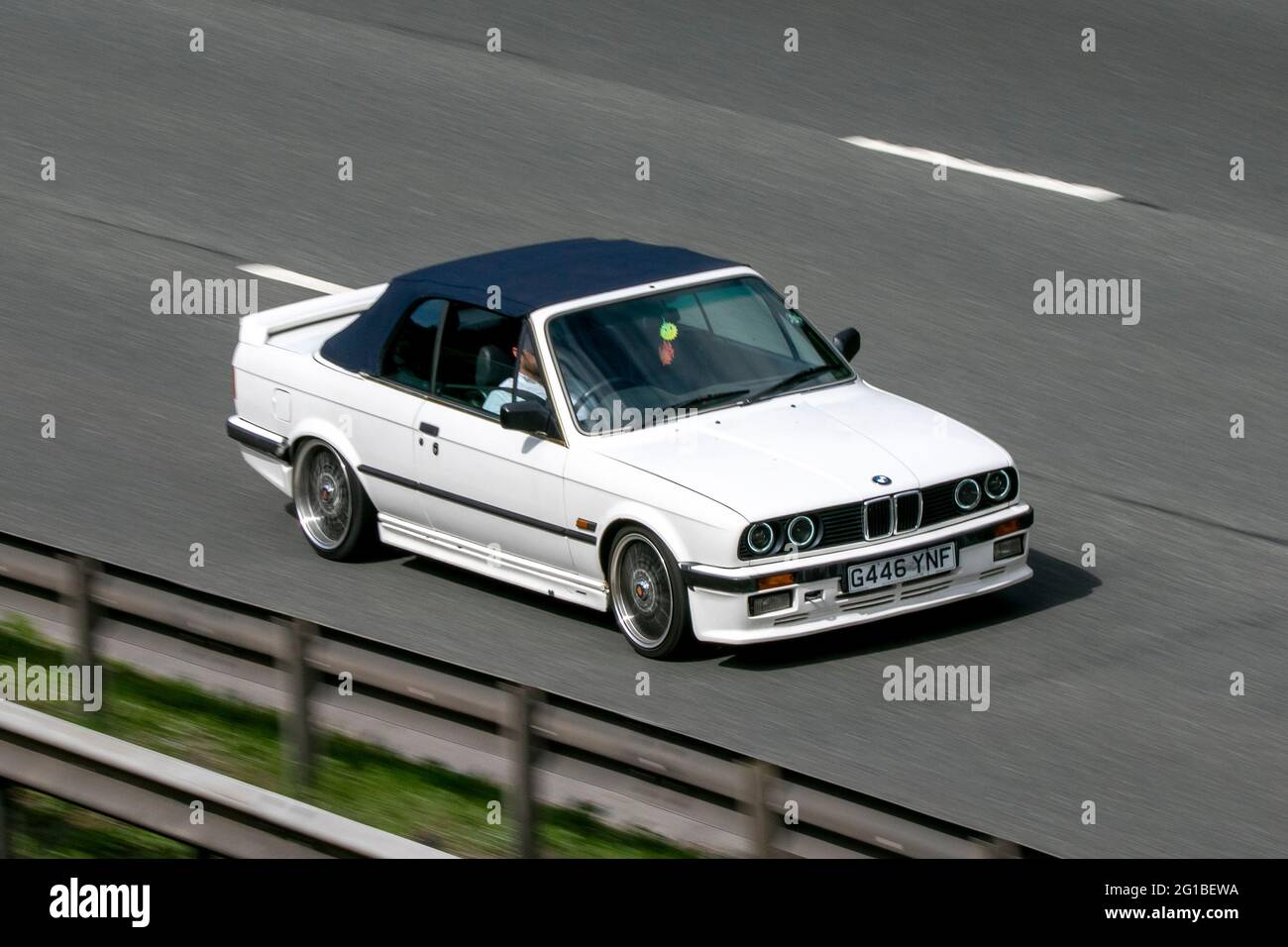1990 90s BMW 325i cabriolet, 2494cc petrol convertible driving on the ...