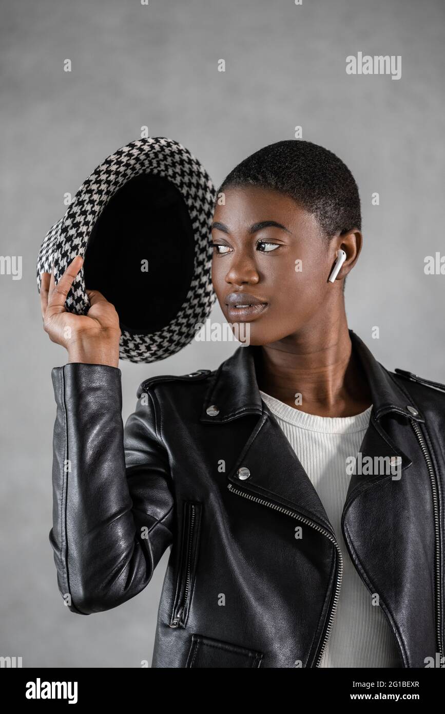 Woman Taking Off Jacket High Resolution Stock Photography and Images ...