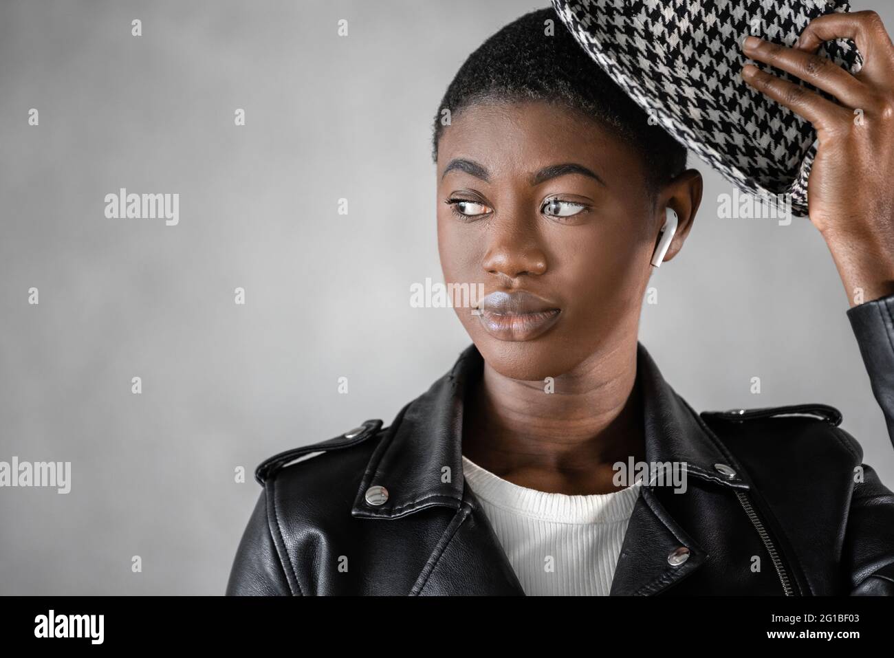 Woman Taking Off Jacket High Resolution Stock Photography and Images ...