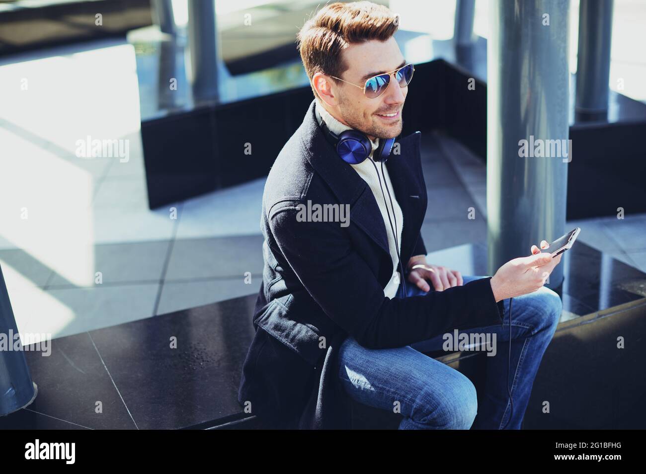Young indian guy serious look hi-res stock photography and images - Alamy