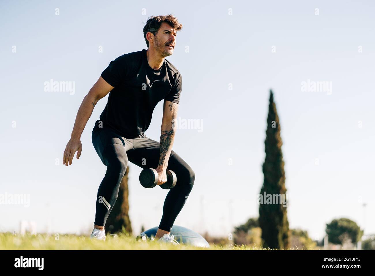 Man performing forward lunge hi-res stock photography and images - Alamy
