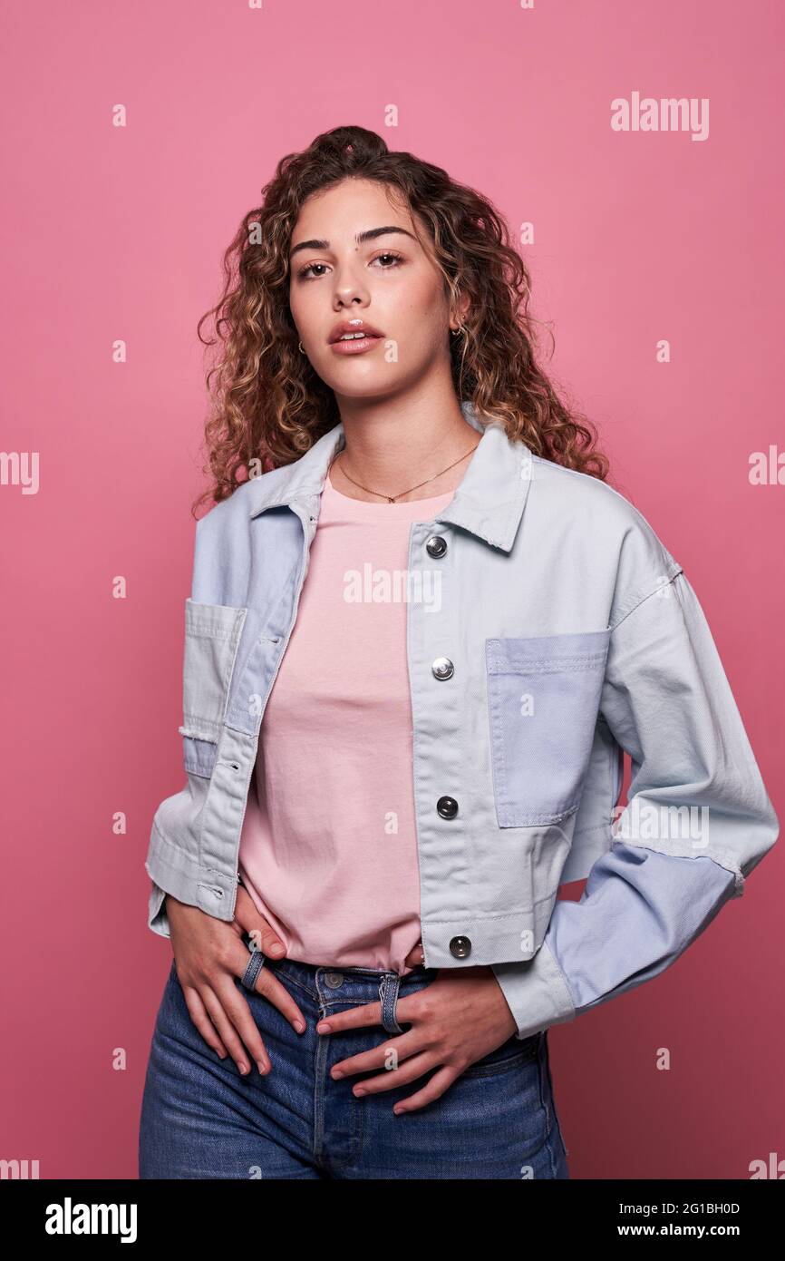 Unemotional female curly hair hi-res stock photography and images - Alamy