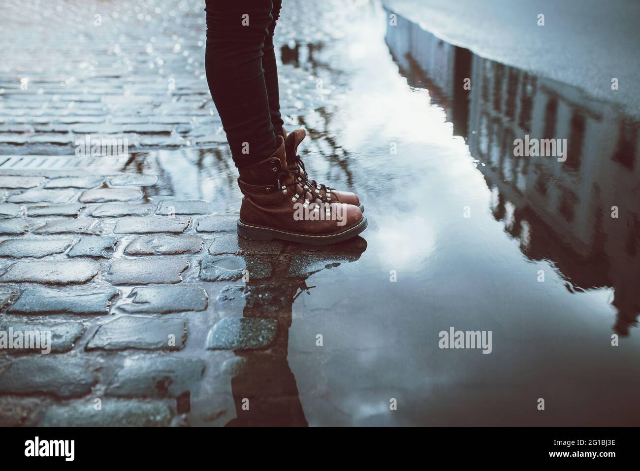 Reflection on puddle in walkway hi-res stock photography and images - Alamy