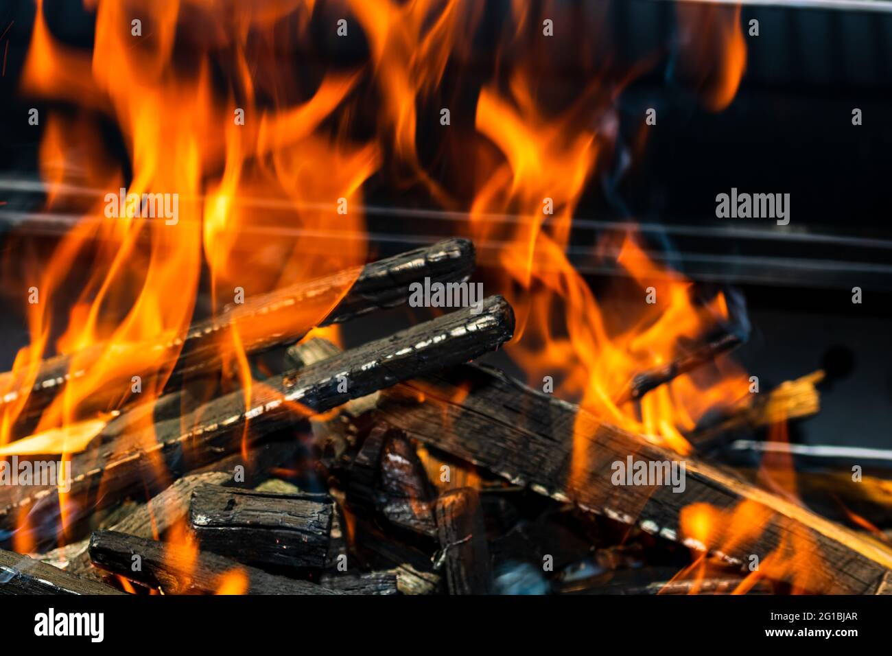 An amazing view of burning wood chips forming coal - Barbecue ...