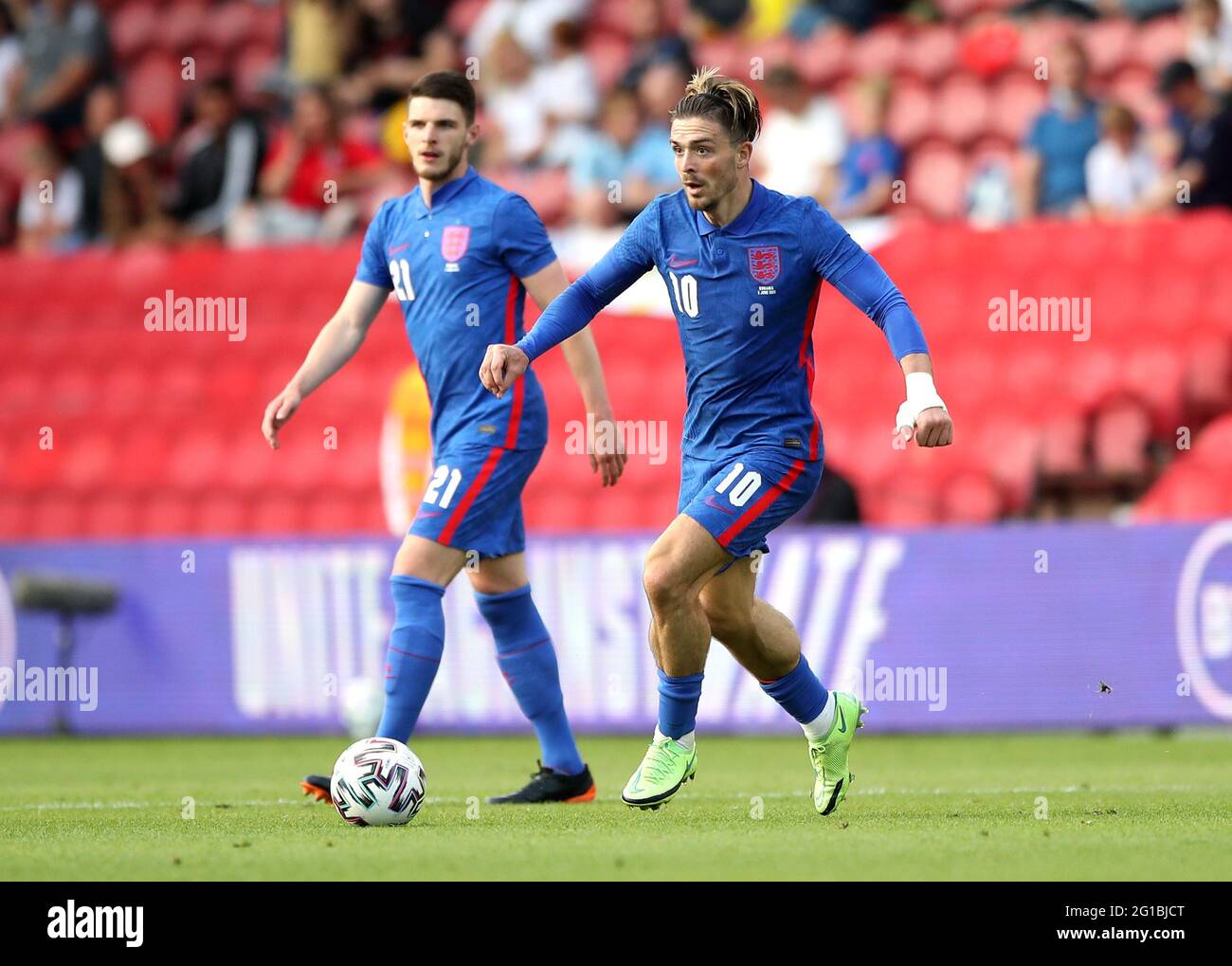 England's Jack Grealish (right) and Declan Rice during the ...