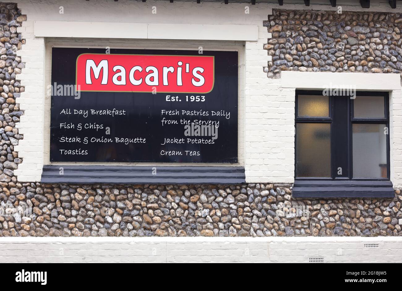Macari's logo seen on a window in Bognor Regis Stock Photo - Alamy