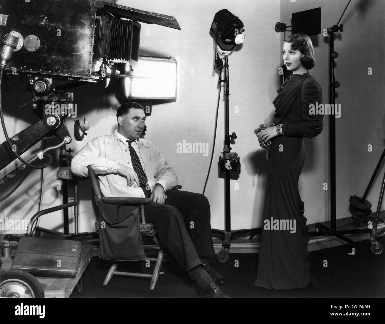 Director WALTER LANG and LORETTA YOUNG on set candid during filming of ...