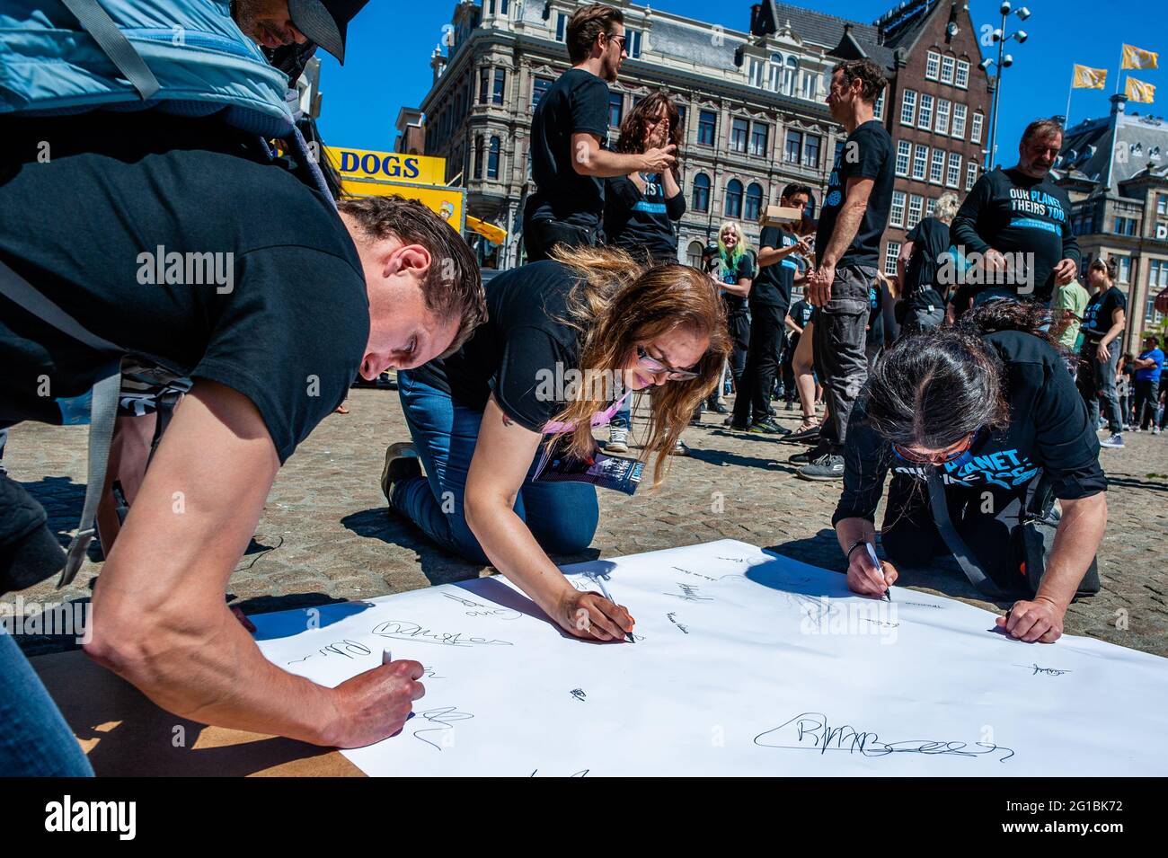 Animal activists are seen signing a Declaration for Animal Rights ...