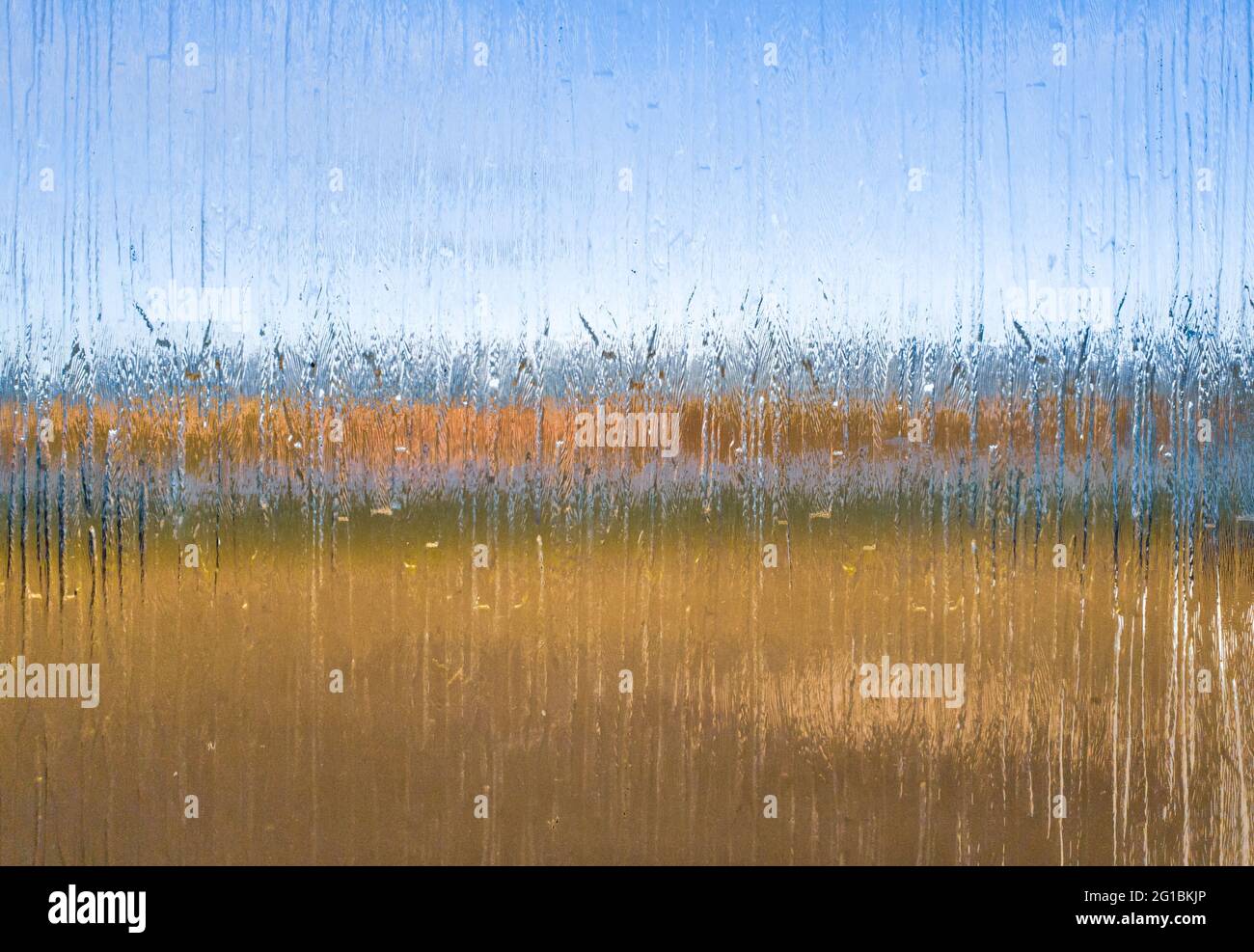 Grain texture glass with the clors of a day in the background Stock ...