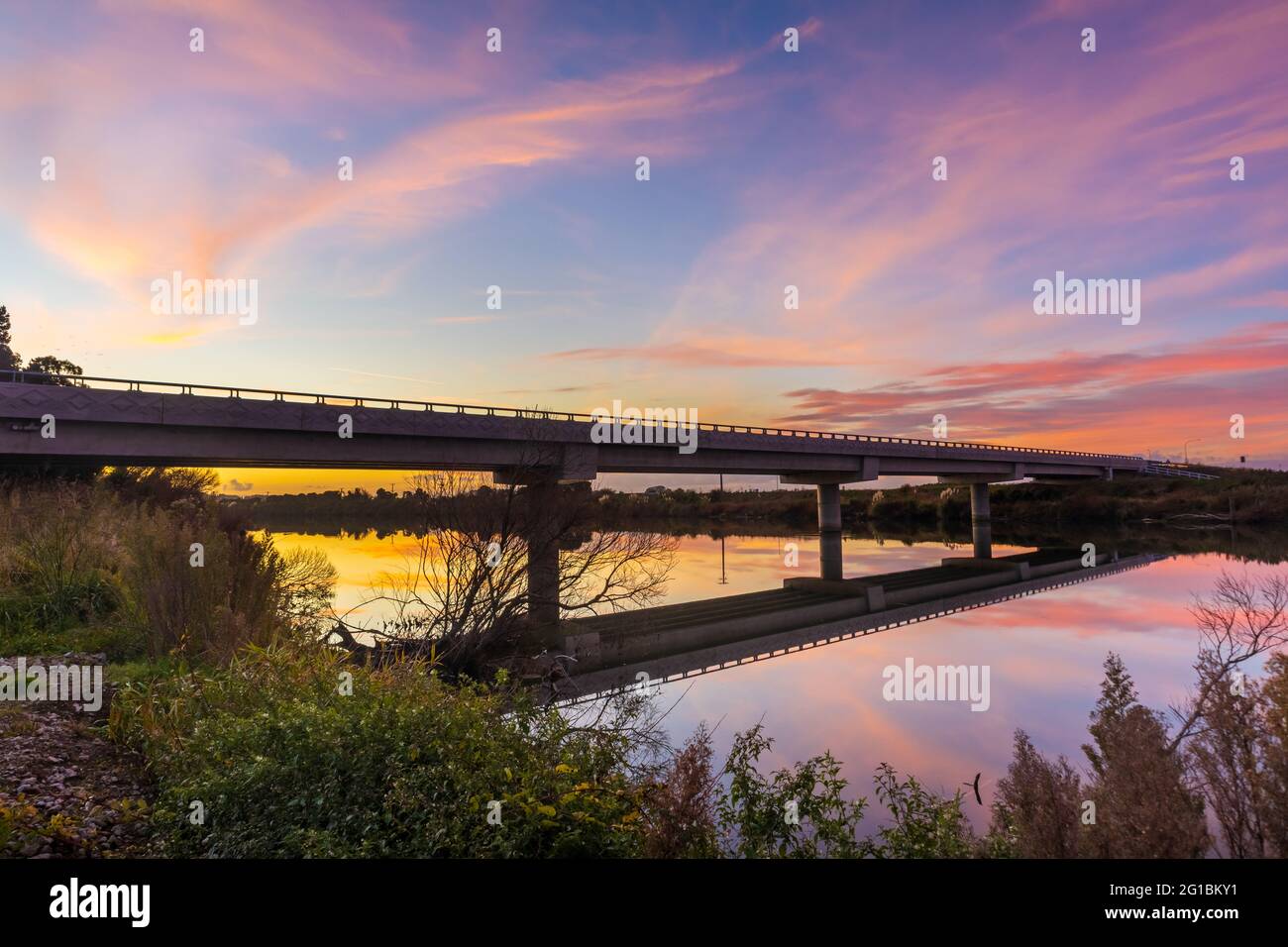 Old main road bridge that crosses over the Manawatu river Stock Photo ...