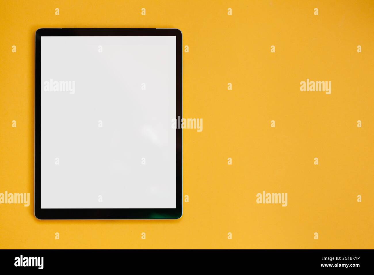 Tablet screen mockup isolated on yellow background, top view Stock ...
