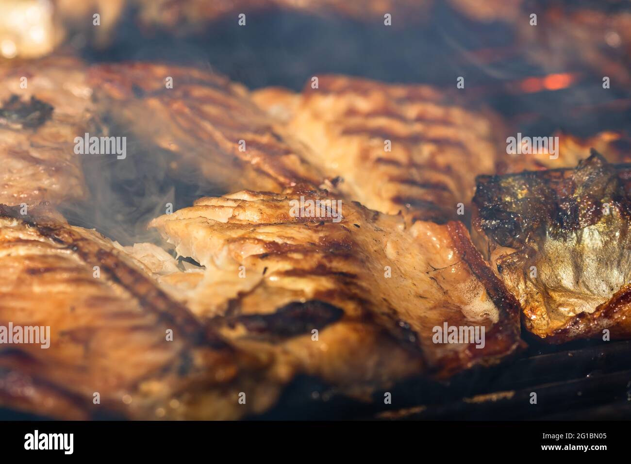 Delicious grilled mackerel fish being cooked on a charcoal grill Stock ...