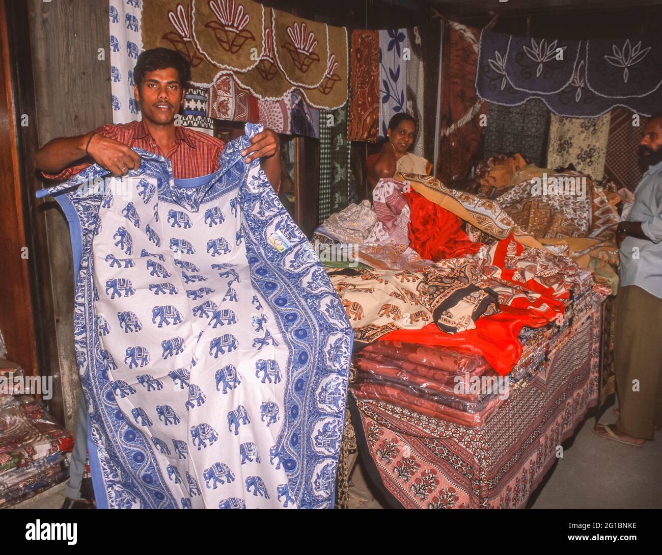 COCHIN, KERALA, INDIA - Fabric vendor in shop Stock Photo - Alamy