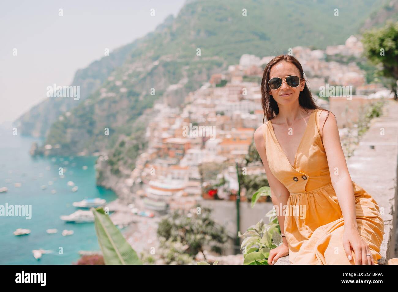 Young woman in Positano beach on Amalfi Coast, Italy Stock Photo - Alamy