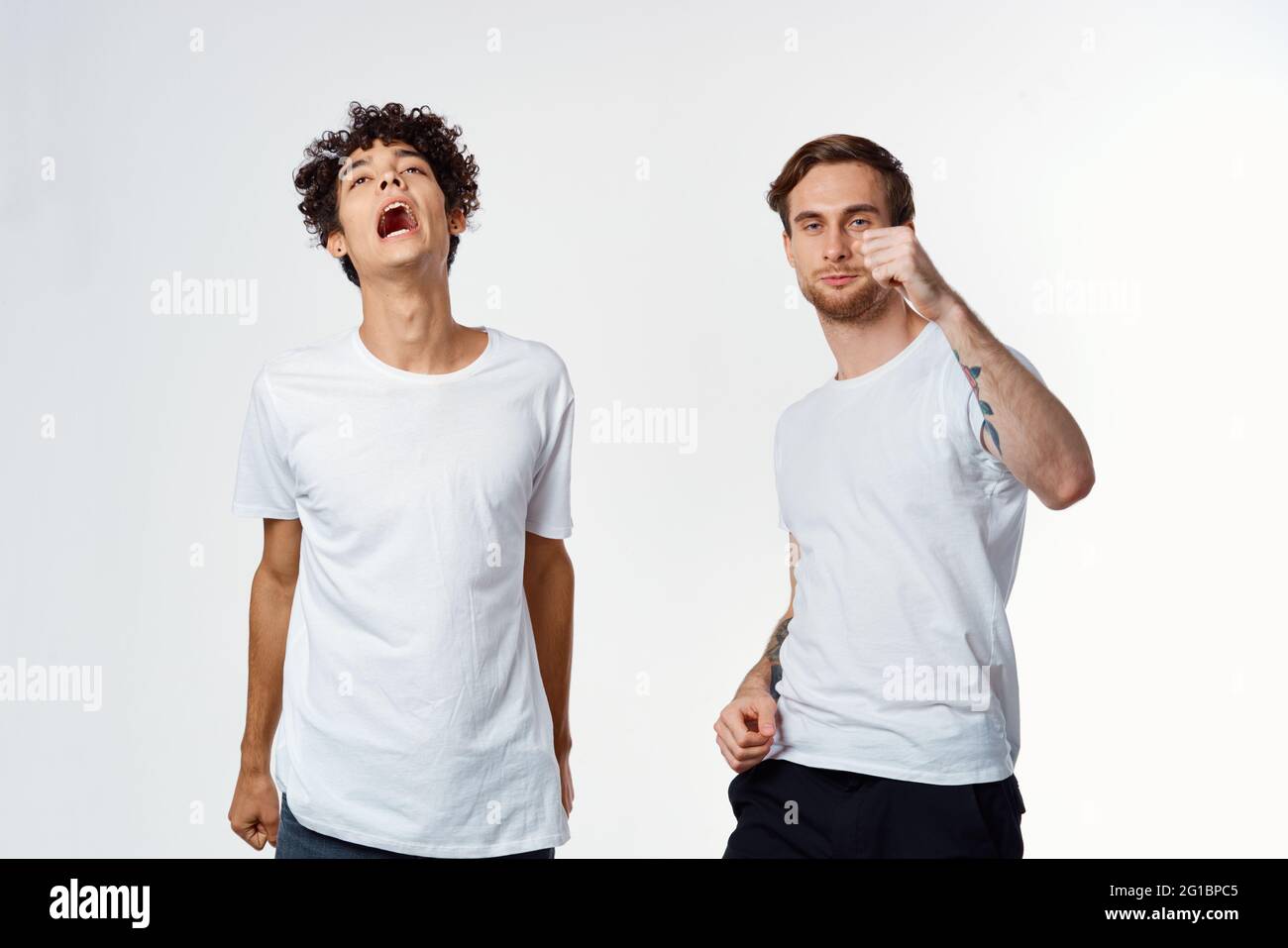 Two men pointing fingers other hi-res stock photography and images - Alamy