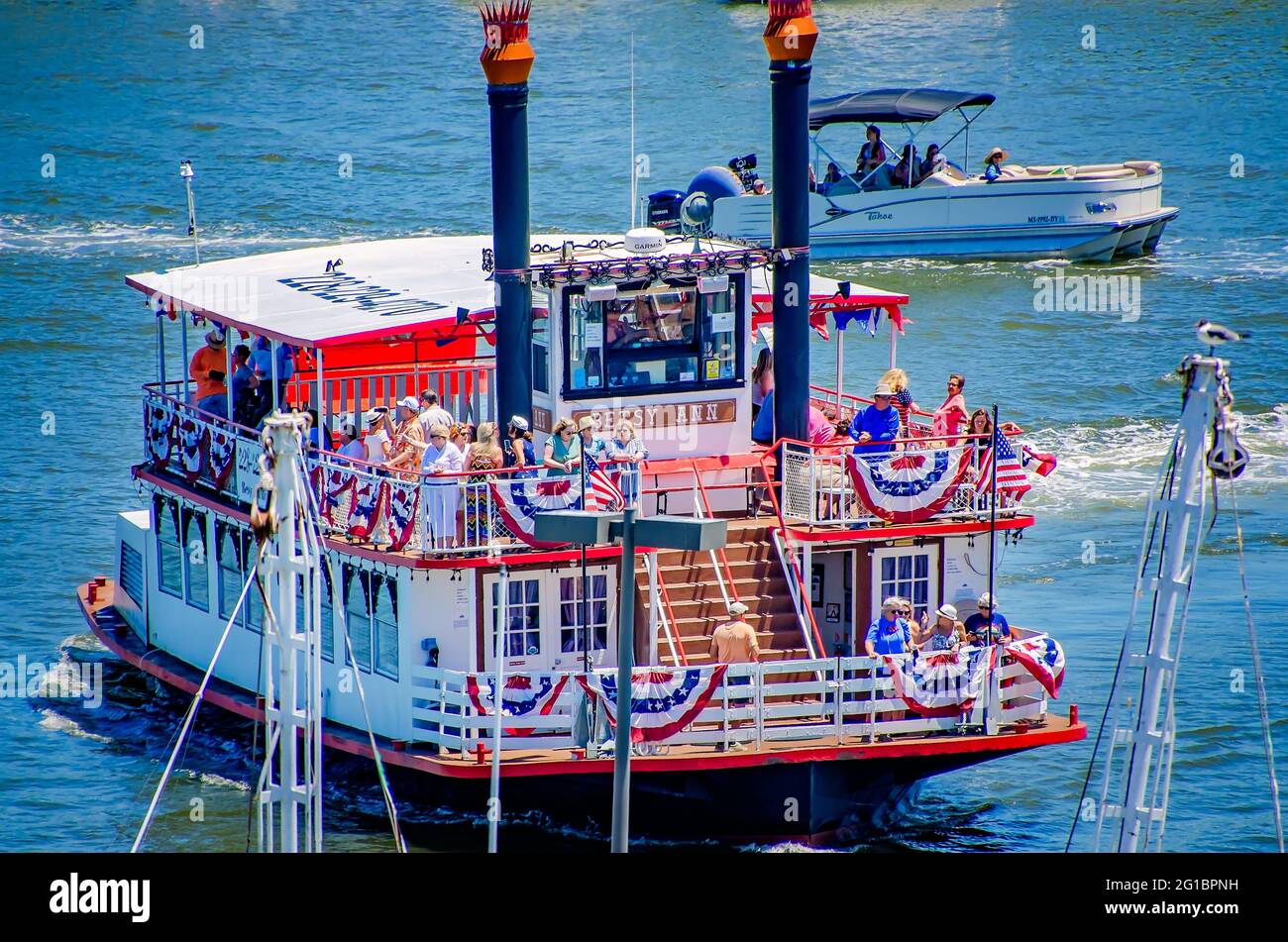 The Betsy Ann riverboat passes between Biloxi Small Craft Harbor and ...