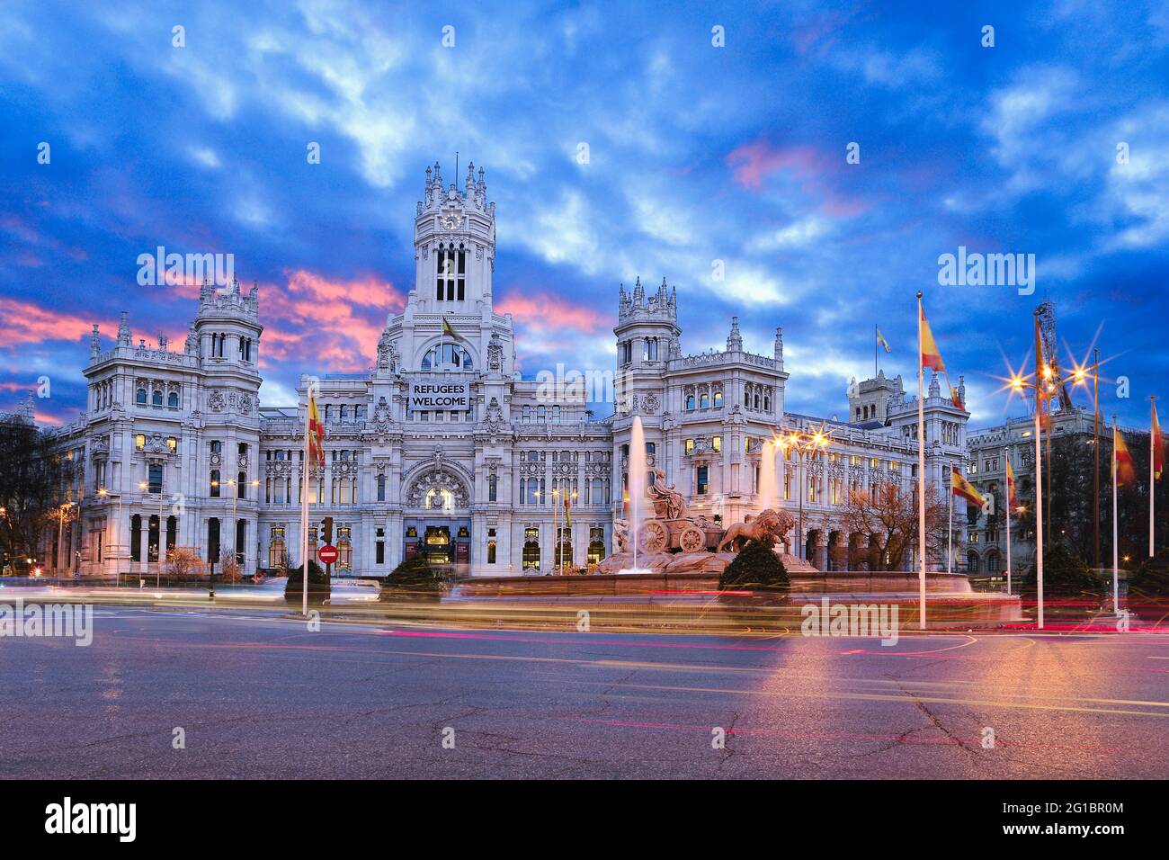 the Plaza Cibeles is a square with a neoclassical palace in Madrid ...